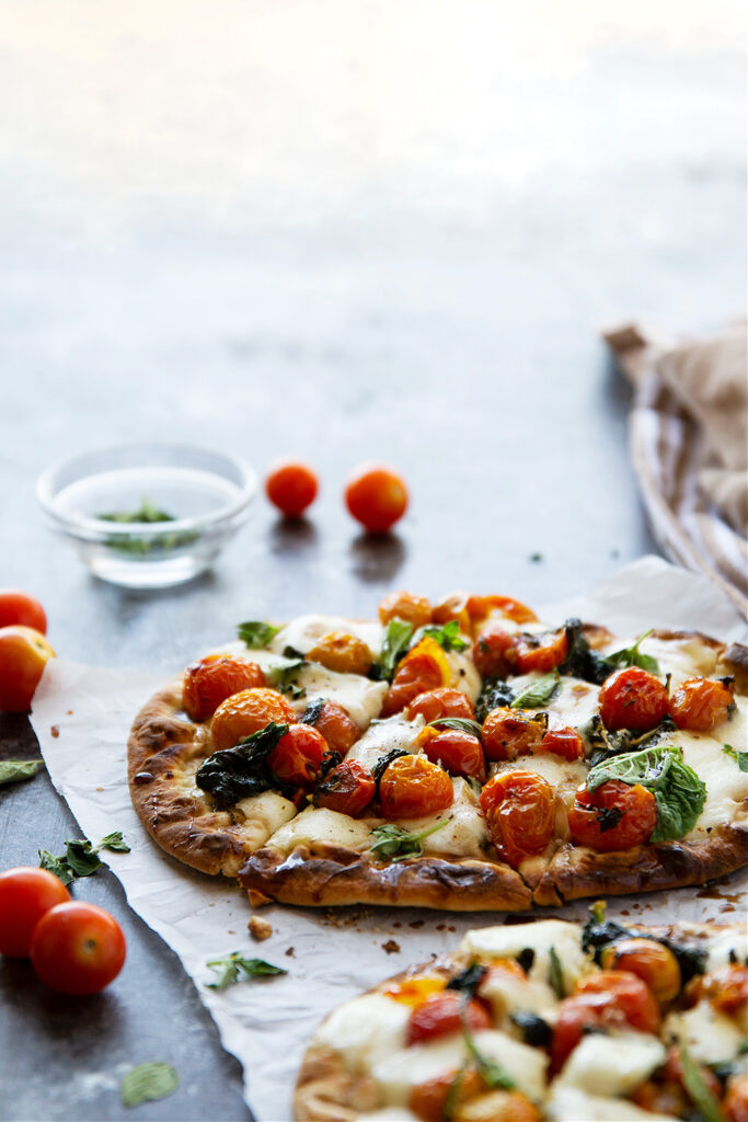 Bursting Tomato Flatbread with Spinach and Burrata