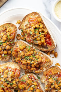 Smashed Chickpea Toast with Cherry Tomato Compote - Whole and Heavenly Oven